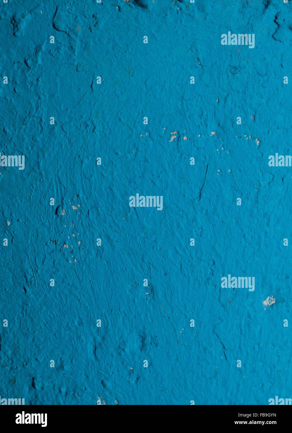 Detail of concrete wall painted in blue color Stock Photo - Alamy