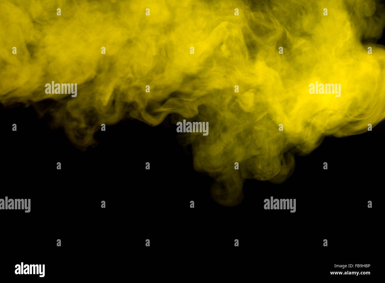 Abstract art. Yellow smoke hookah on a black background. Inhalation ...