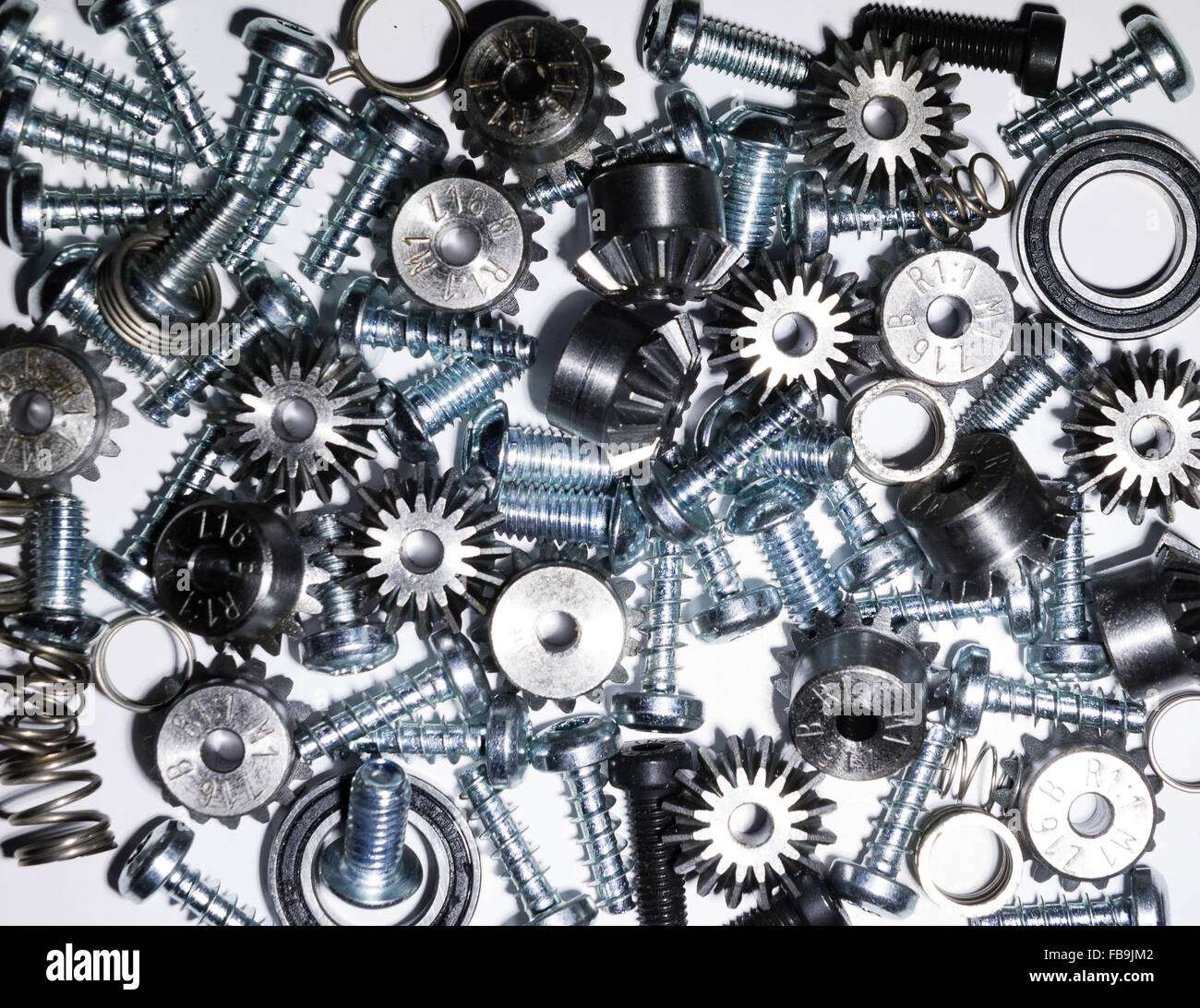 A background with different mechanical components, gears, springs ...
