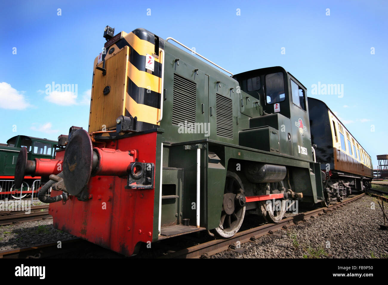 Renovated diesel shunting engine and passenger carriage at local ...