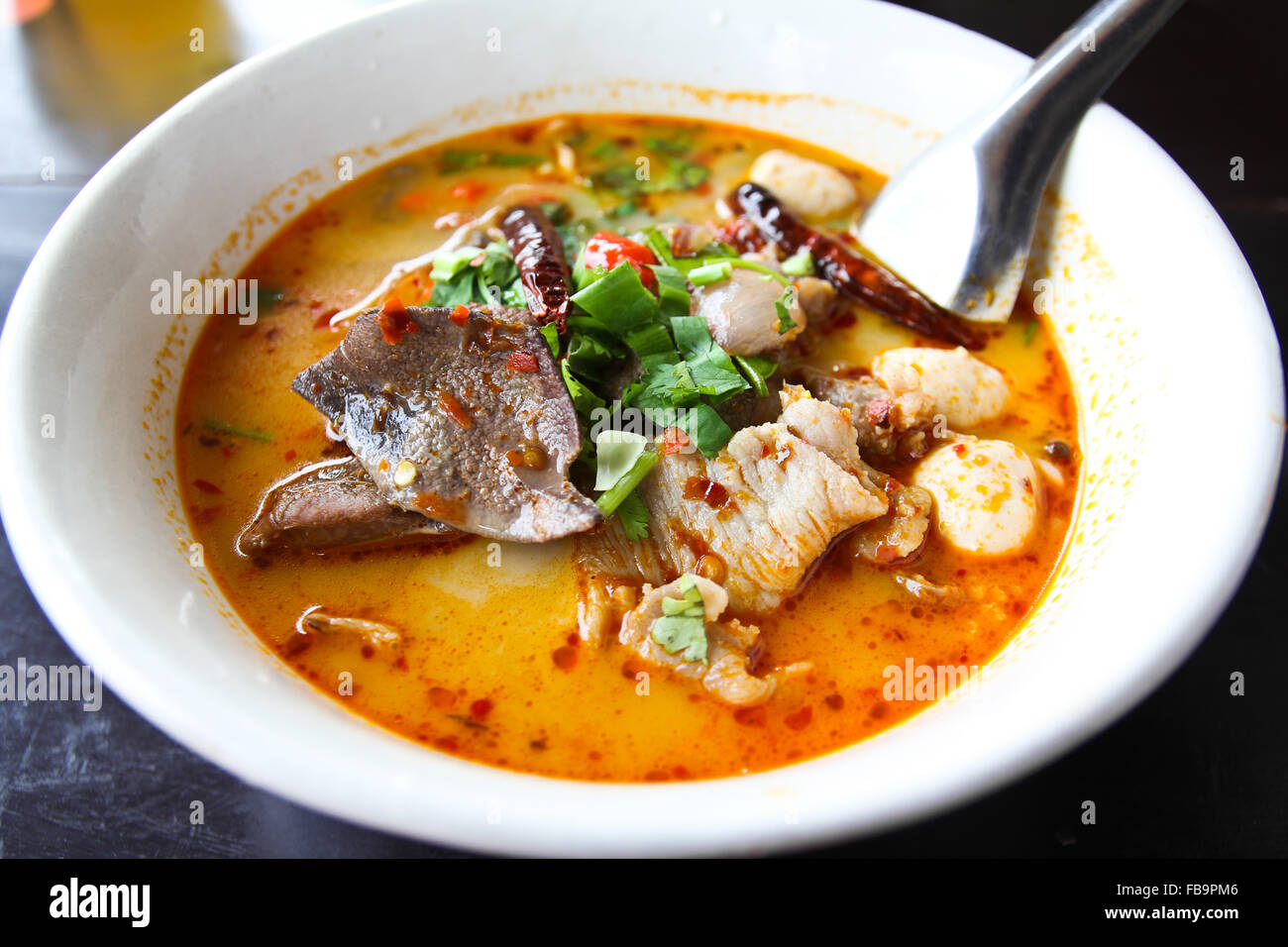 Pork noodle tom yum ,Thai food Stock Photo - Alamy