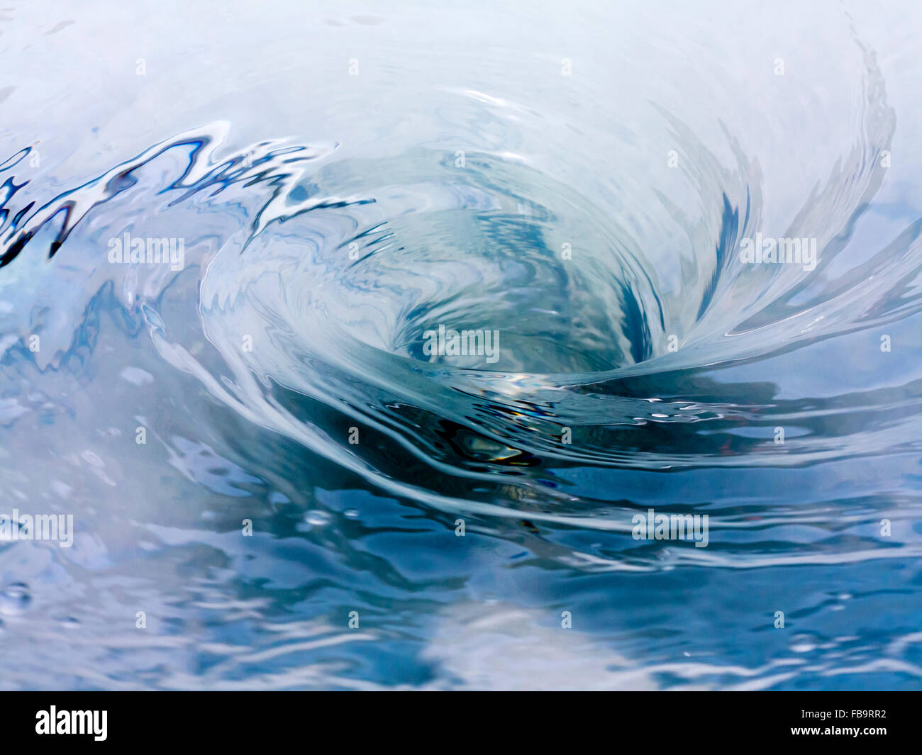 Water flowing in a vortex pattern into a hole Stock Photo - Alamy