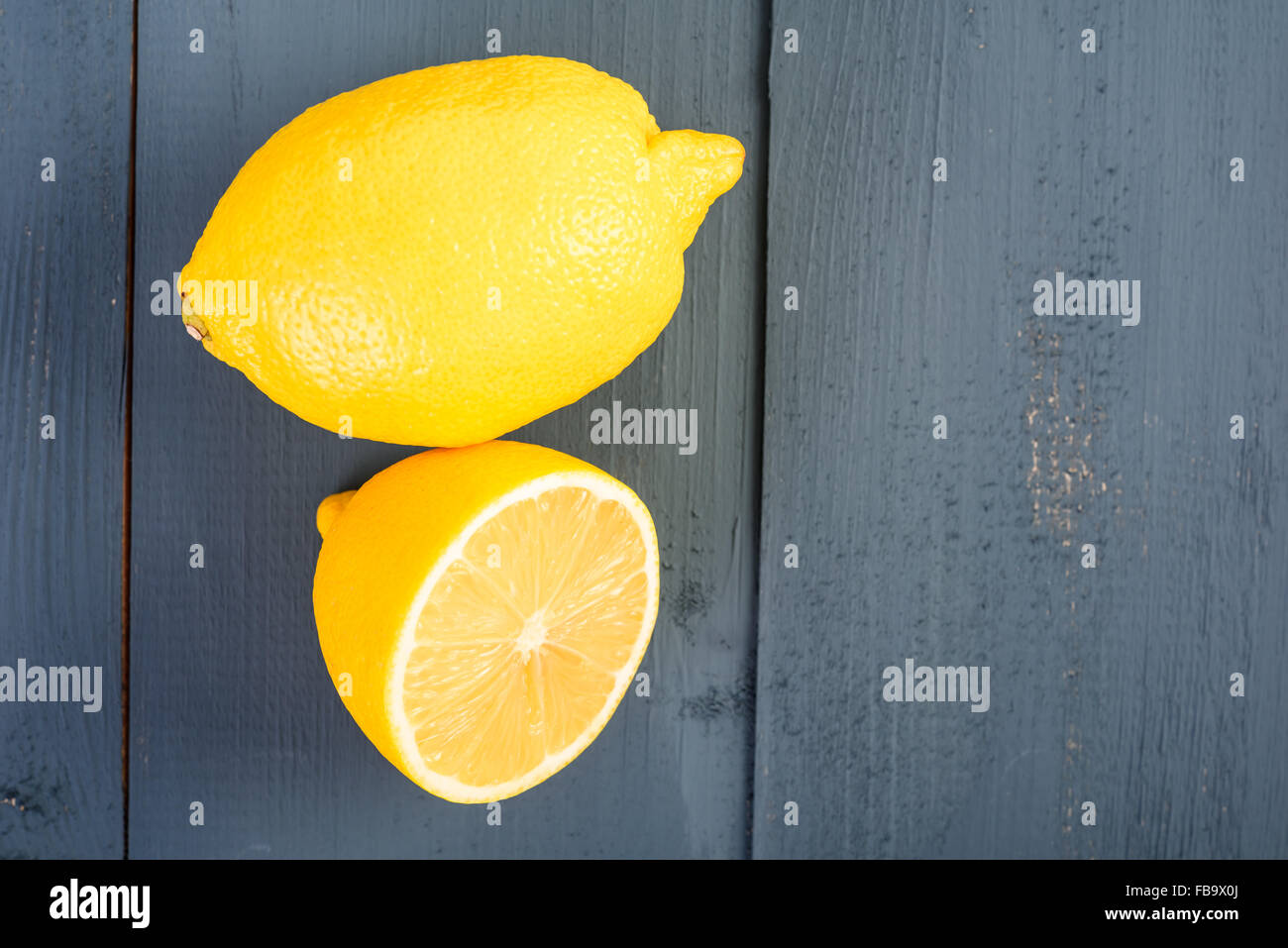 Fresh Yellow Lemons On Wood Table Stock Photo - Alamy