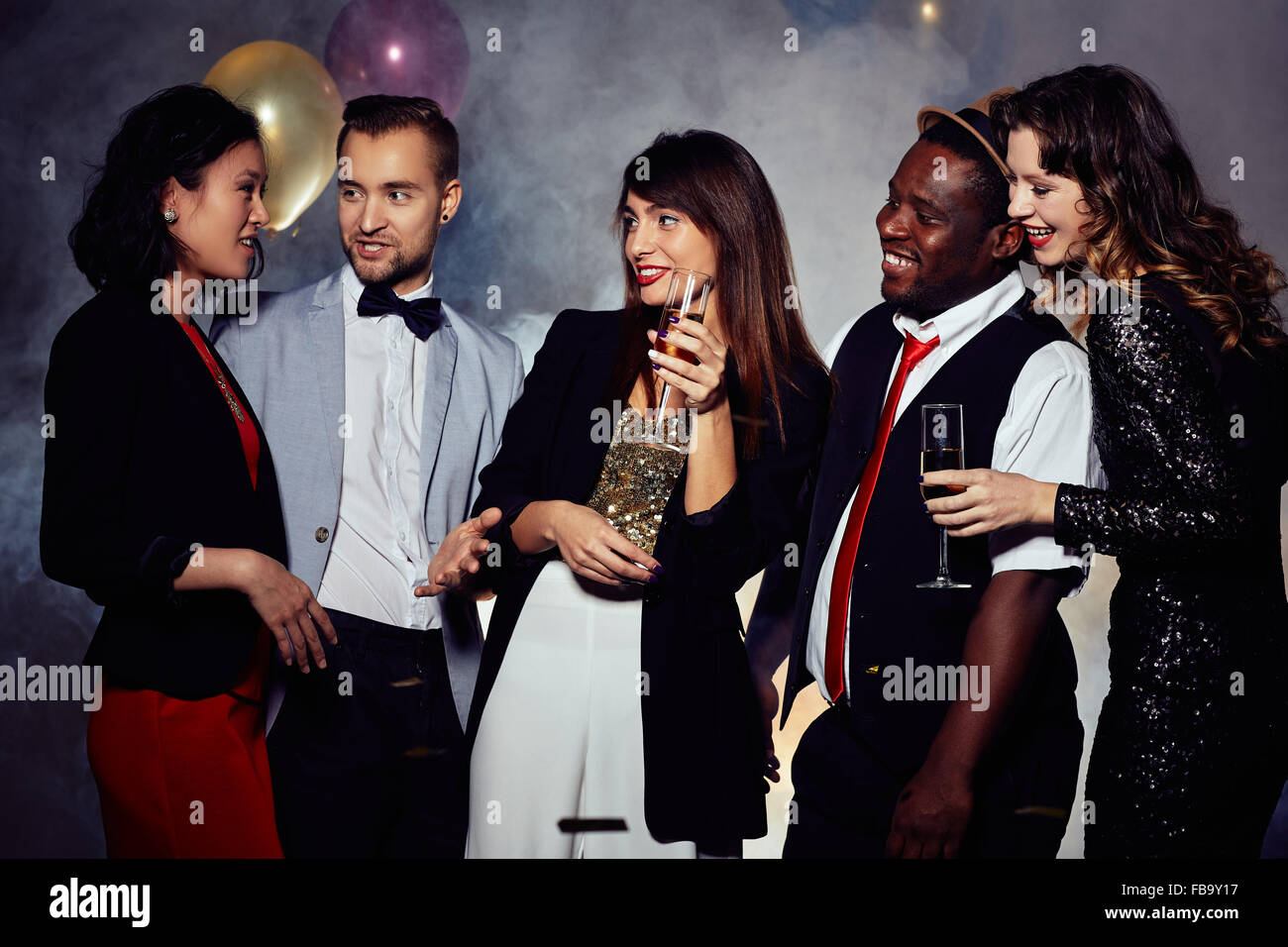 Friends enjoying party together Stock Photo - Alamy