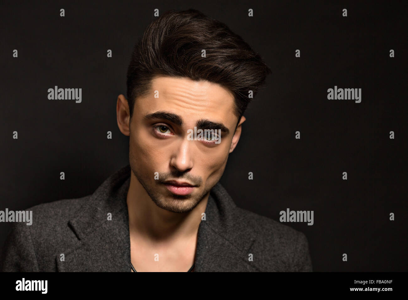 Model man isolated on black background Stock Photo - Alamy