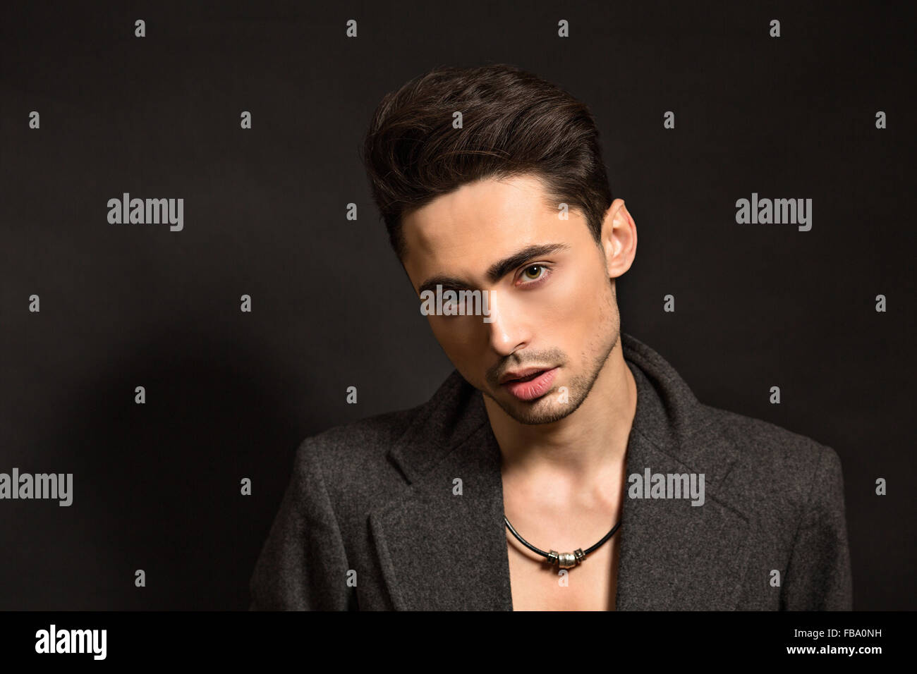 Model man isolated on black background Stock Photo - Alamy