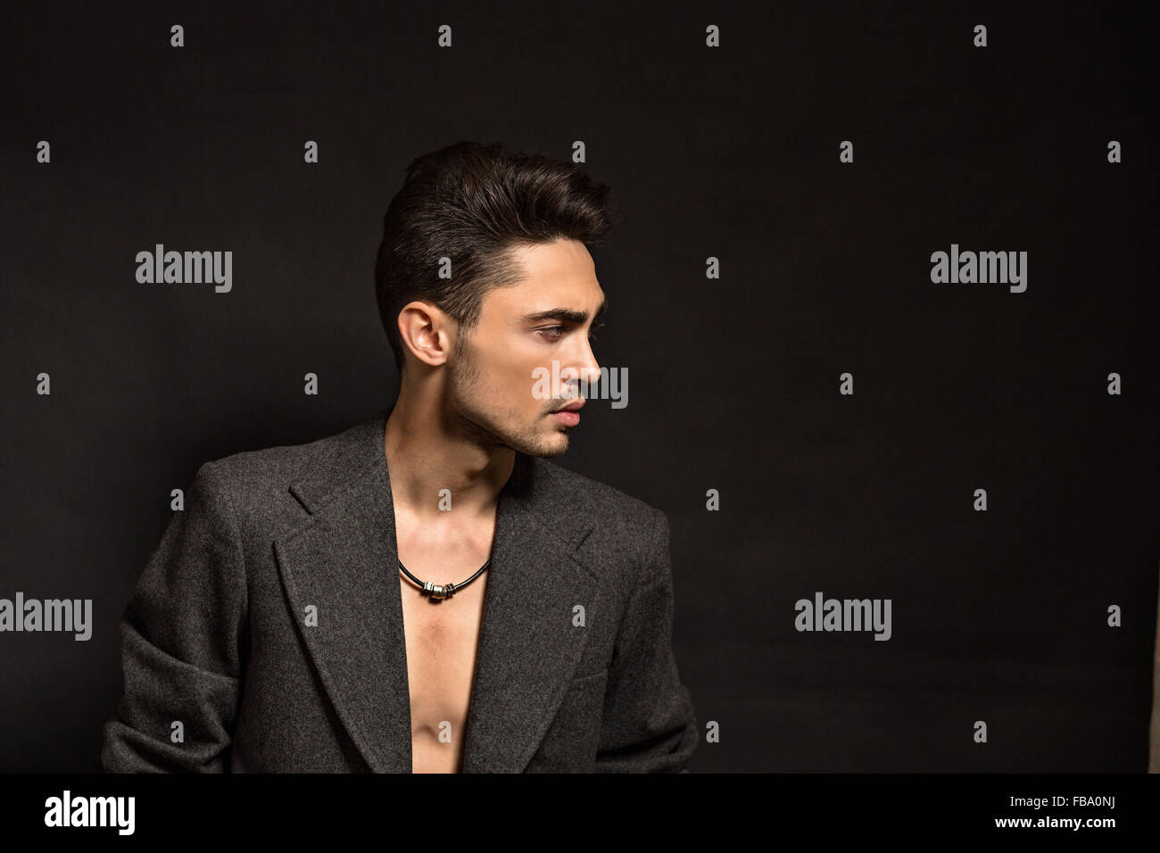 Model man isolated on black background Stock Photo - Alamy