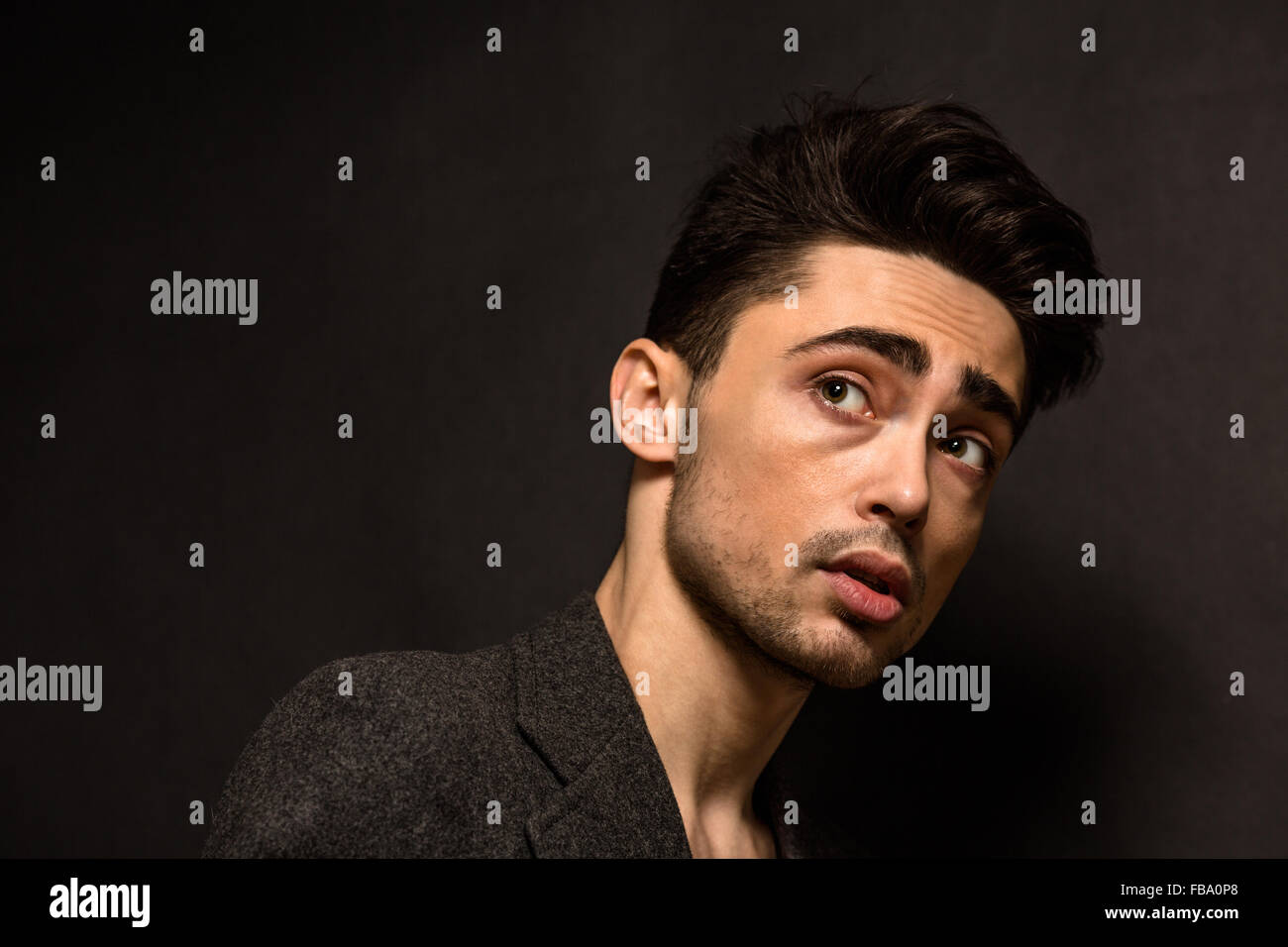 Portrait of model man's face in studio Stock Photo - Alamy