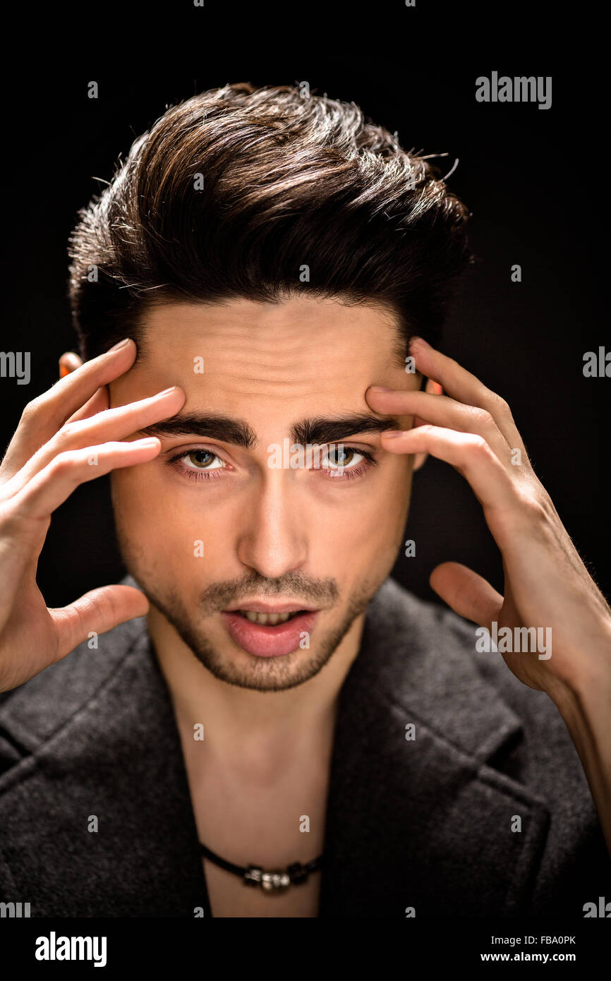 Portrait of model man's face in studio Stock Photo - Alamy