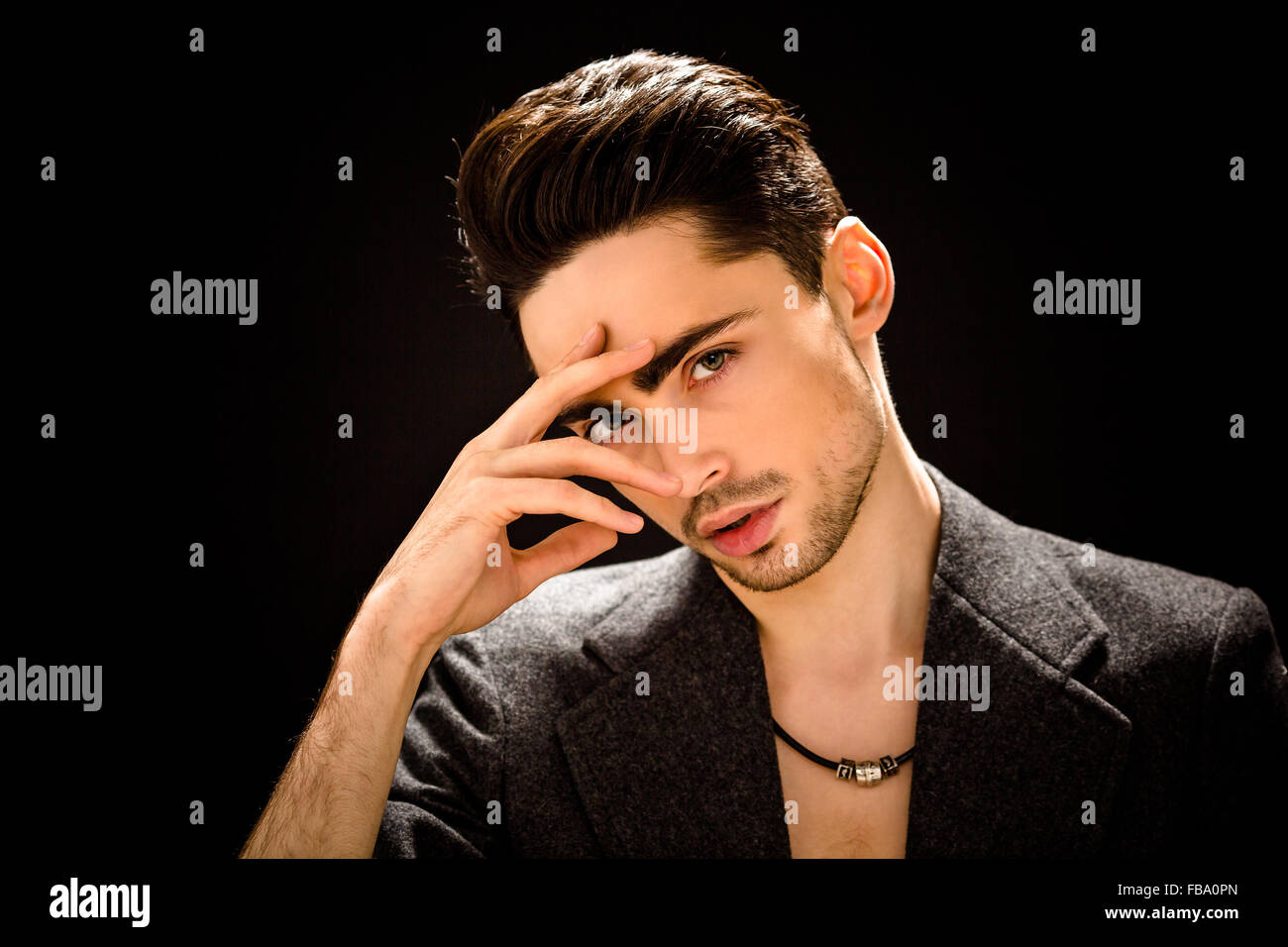 Portrait of model man's face in studio Stock Photo - Alamy