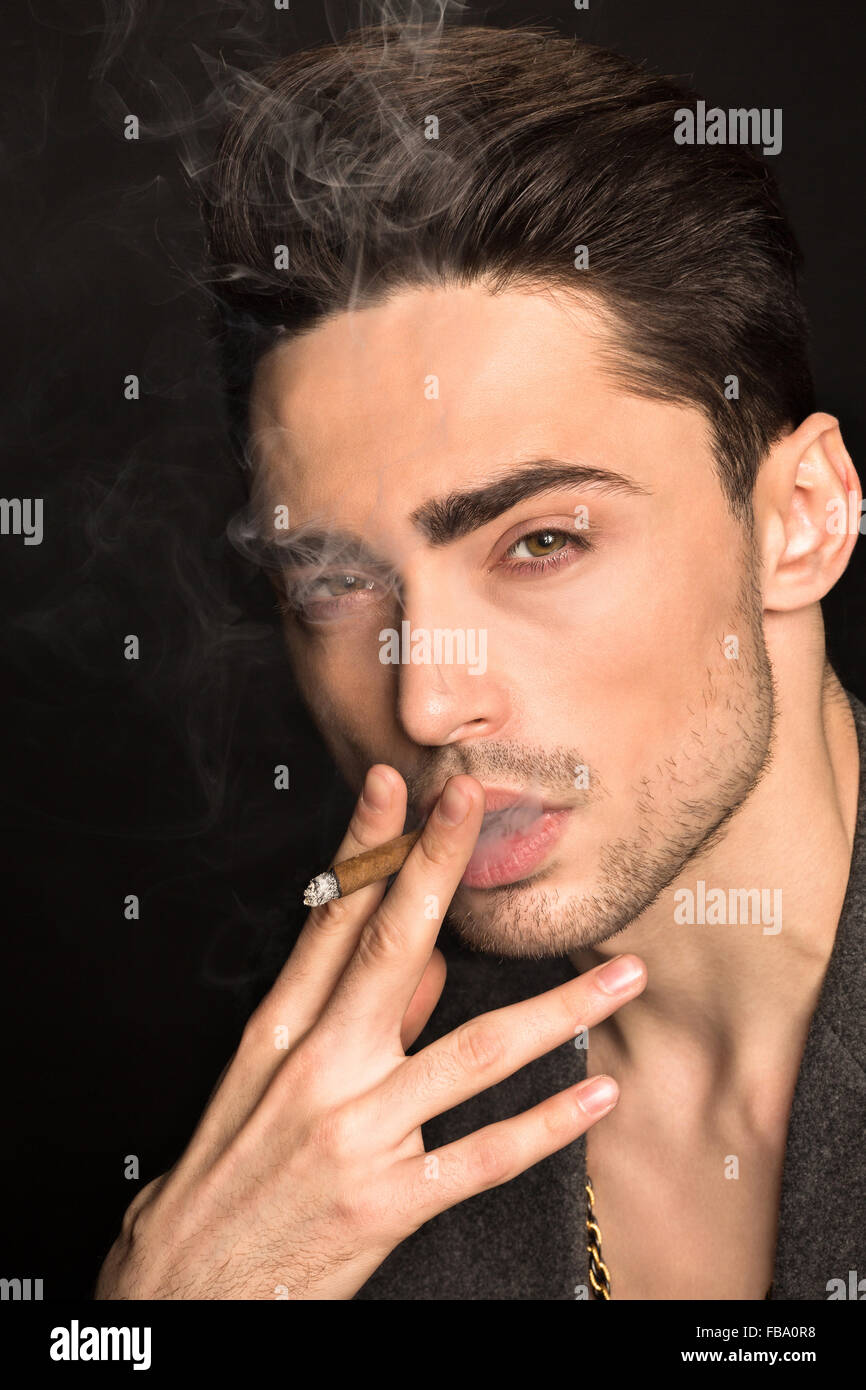 Fashion model smoking cigarette hi-res stock photography and images - Alamy