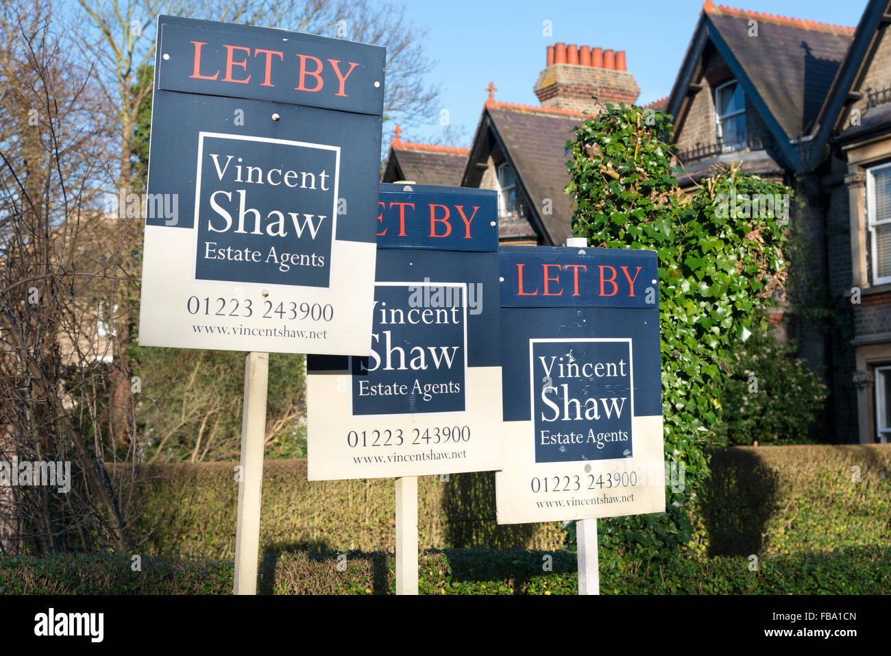 To Let signs outside houses in Cambridge UK by Vincent Shaw Estate ...