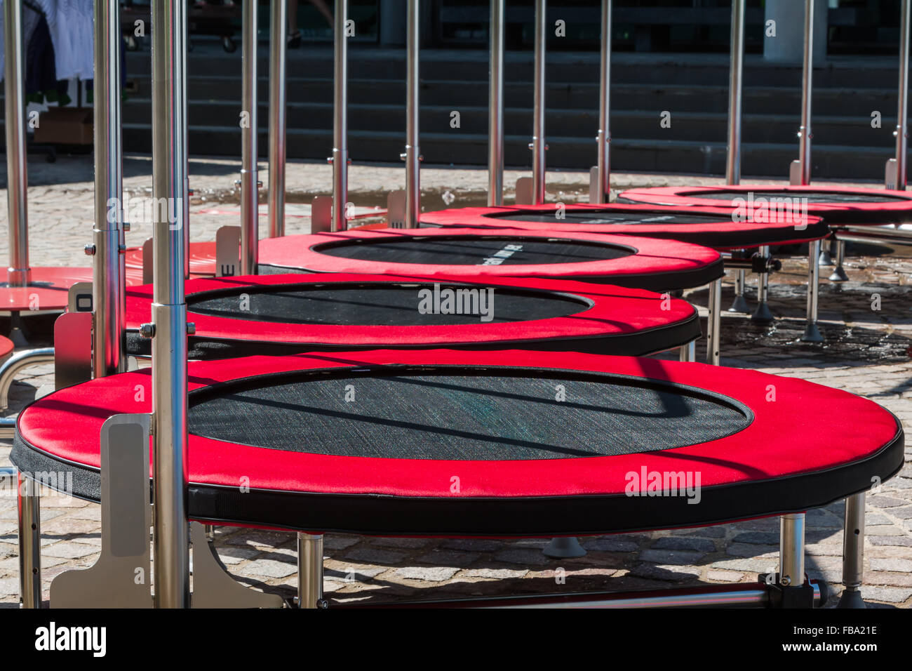 Group of Red Mini Trampoline for Fitness Activity Stock Photo - Alamy