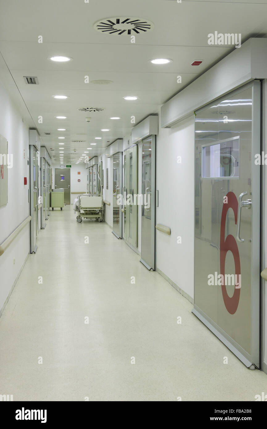 Operating rooms corridor with number six on access door vertical image ...