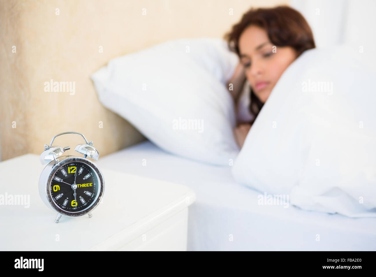 Sleepy woman in her bed Stock Photo - Alamy