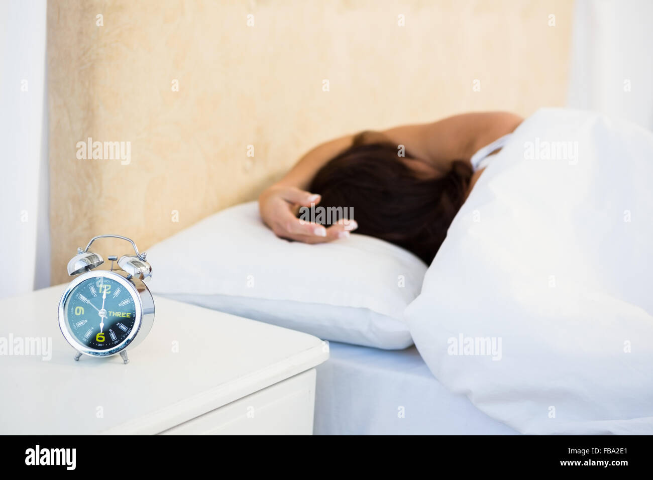 Sleepy woman in her bed Stock Photo - Alamy