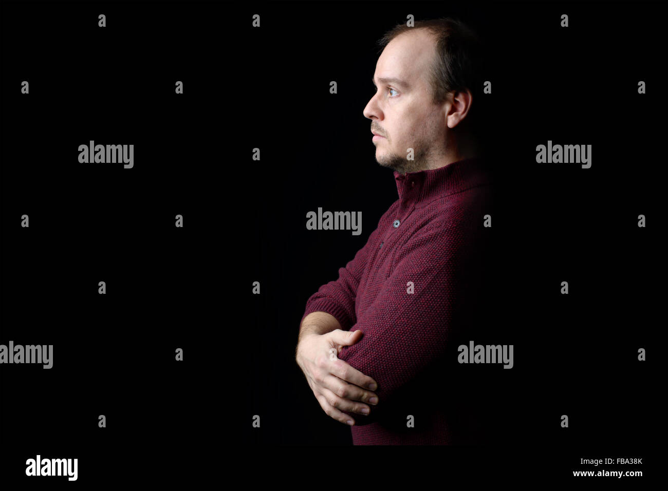 Men holding arms side face Stock Photo - Alamy