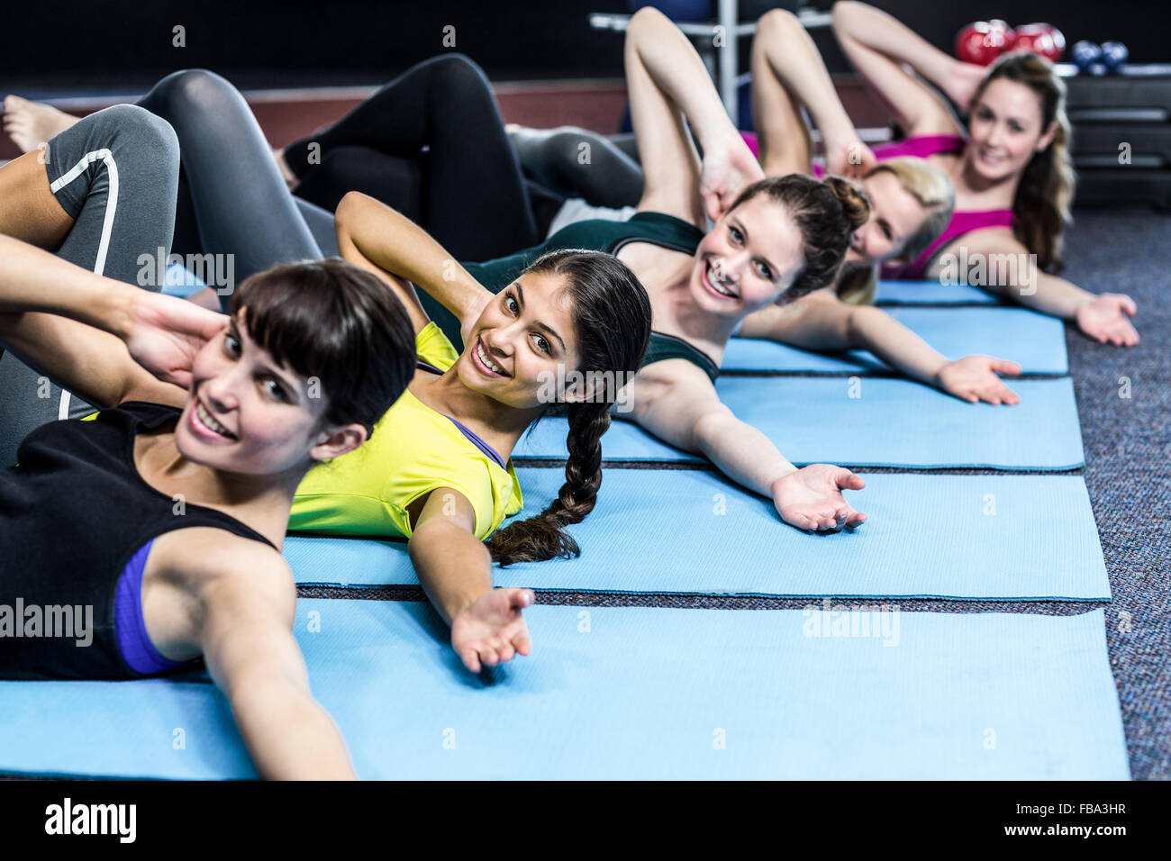 Fitness class doing exercises Stock Photo - Alamy