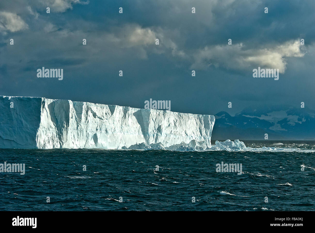 Melting Antarctic ice sheet. One of 3 images of calving ice cliff Stock ...