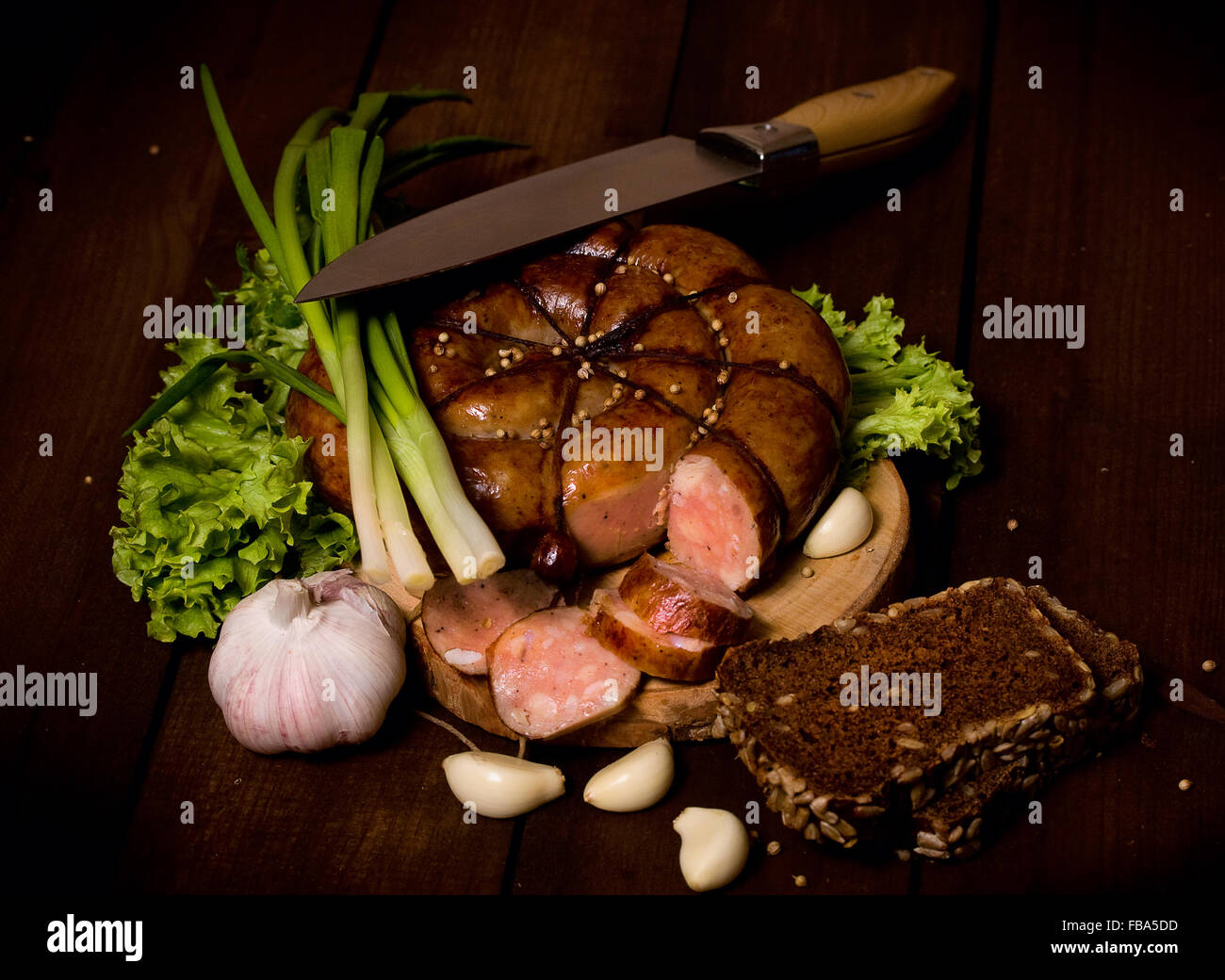 rustic still life with sausage Stock Photo - Alamy