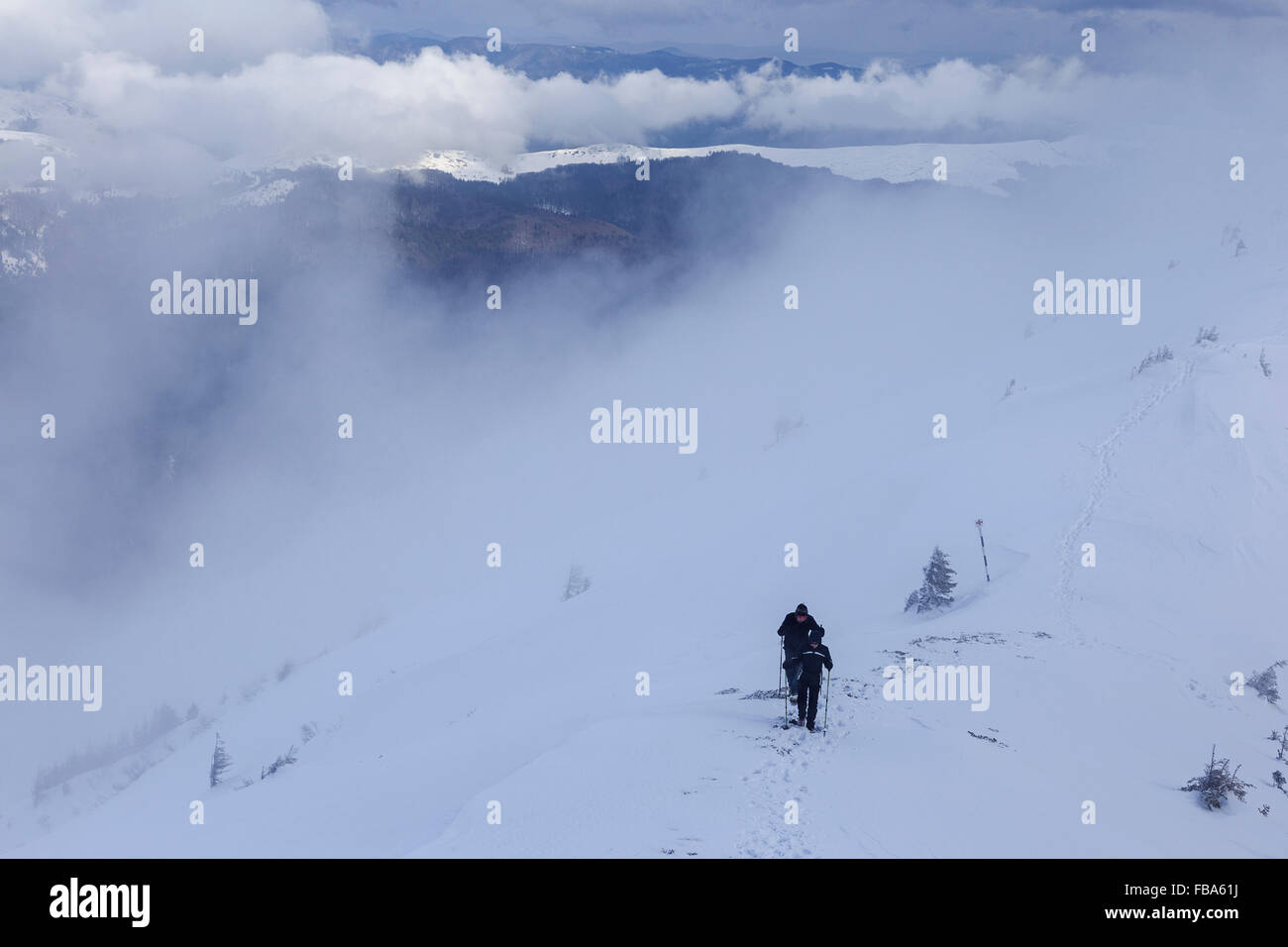Fog mountain climb hi-res stock photography and images - Alamy