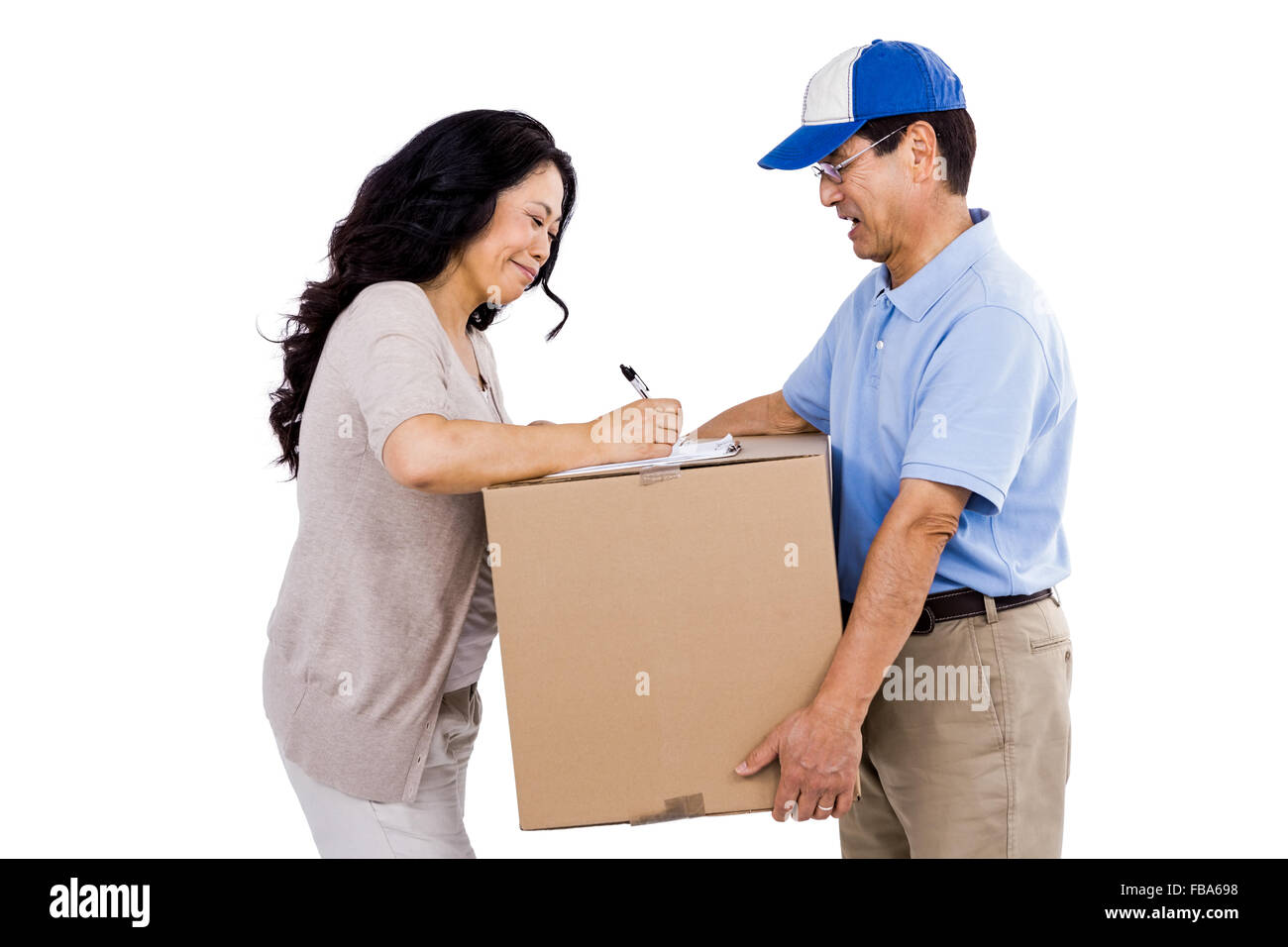 Signing for a parcel hi-res stock photography and images - Alamy
