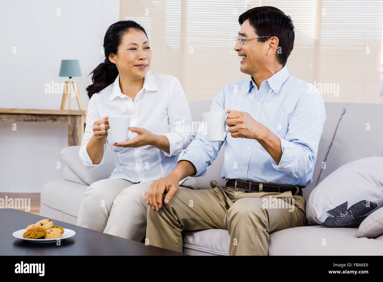 Happy get together hi-res stock photography and images - Alamy