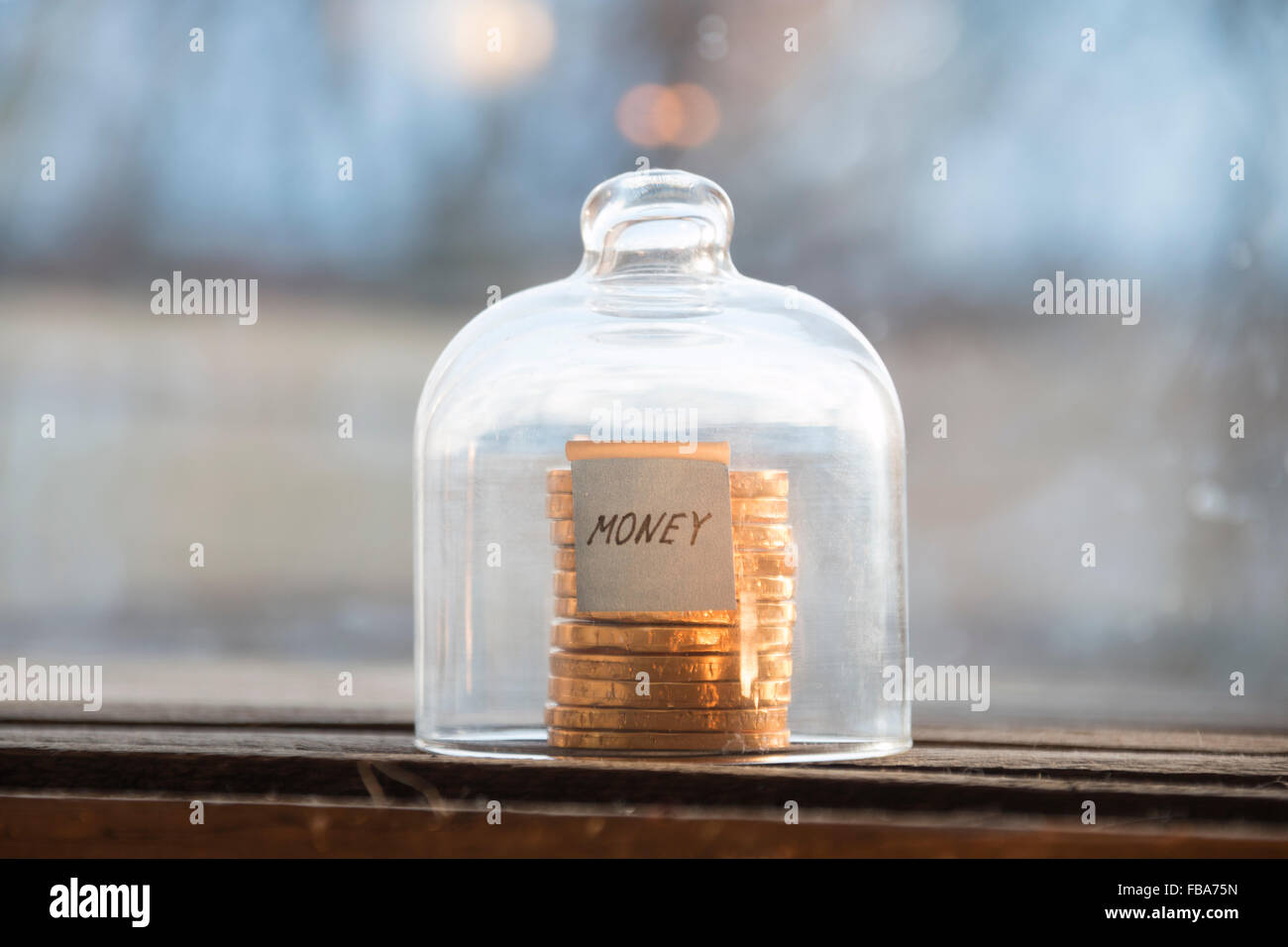 money concept, gold coins and a tag with the inscription money Stock ...