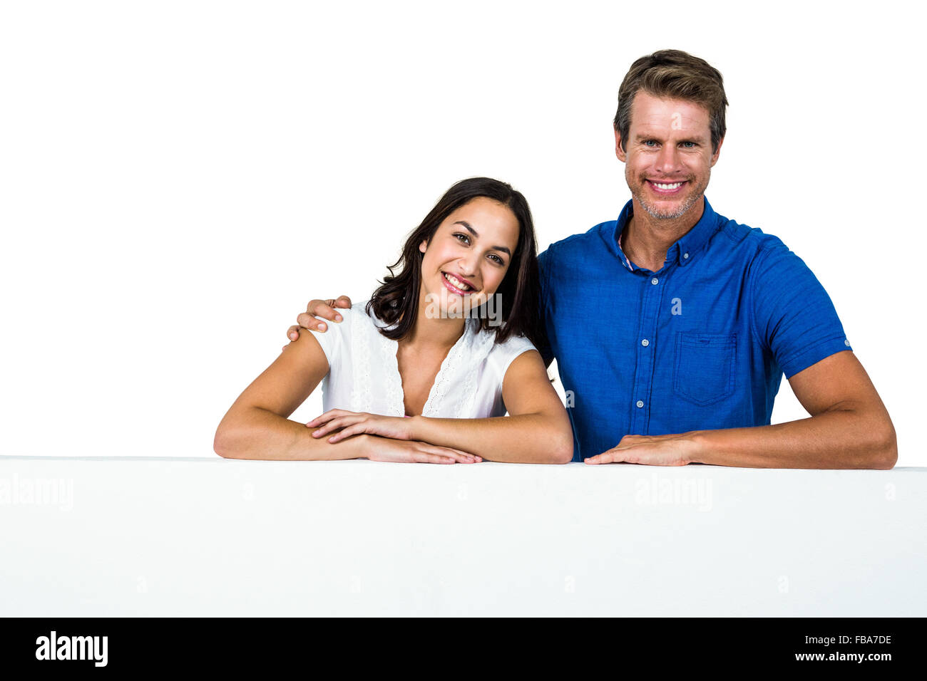 Happy couple against white background Stock Photo - Alamy