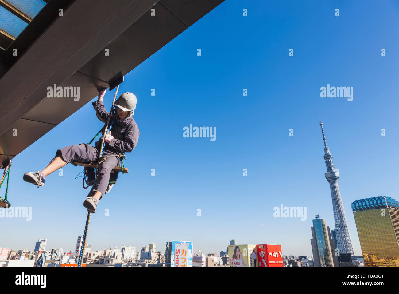 Japan, Honshu, Tokyo, Asakusa, Tokyo Sky Tree and Window Cleaner Stock ...