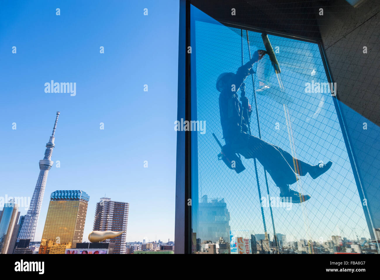 Japan, Honshu, Tokyo, Asakusa, Tokyo Sky Tree and Window Cleaner Stock ...