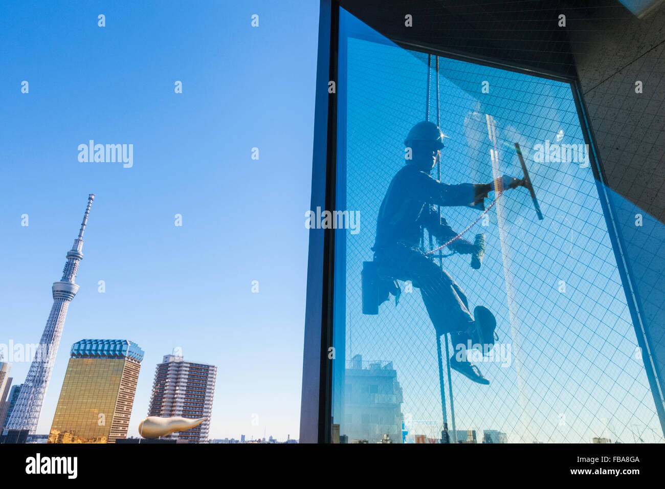 Japan, Honshu, Tokyo, Asakusa, Tokyo Sky Tree and Window Cleaner Stock ...