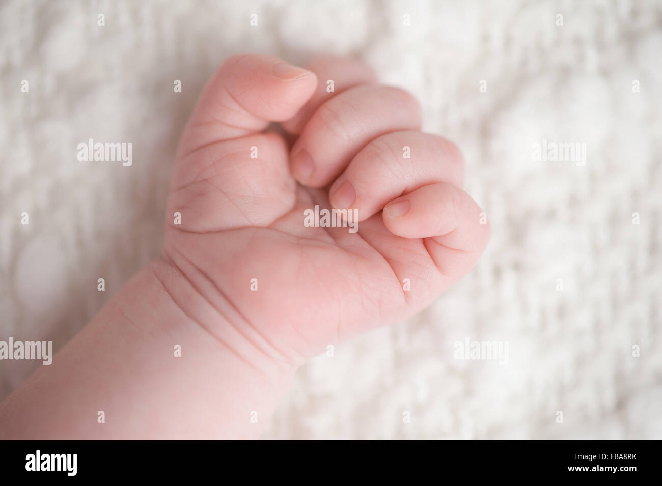 Baby fingers hand hi-res stock photography and images - Alamy