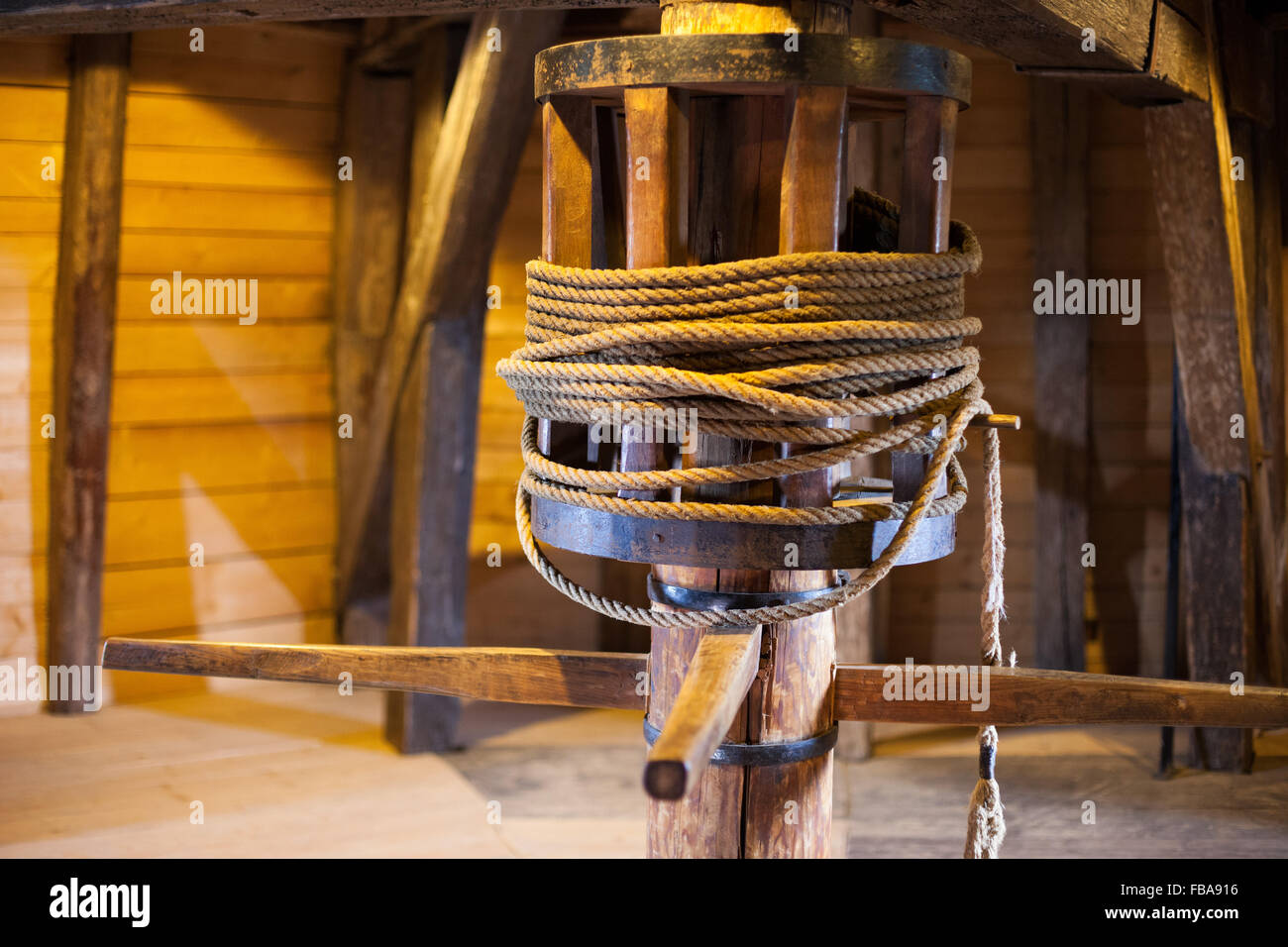 Medieval winch for hoisting loads up a tower Stock Photo - Alamy