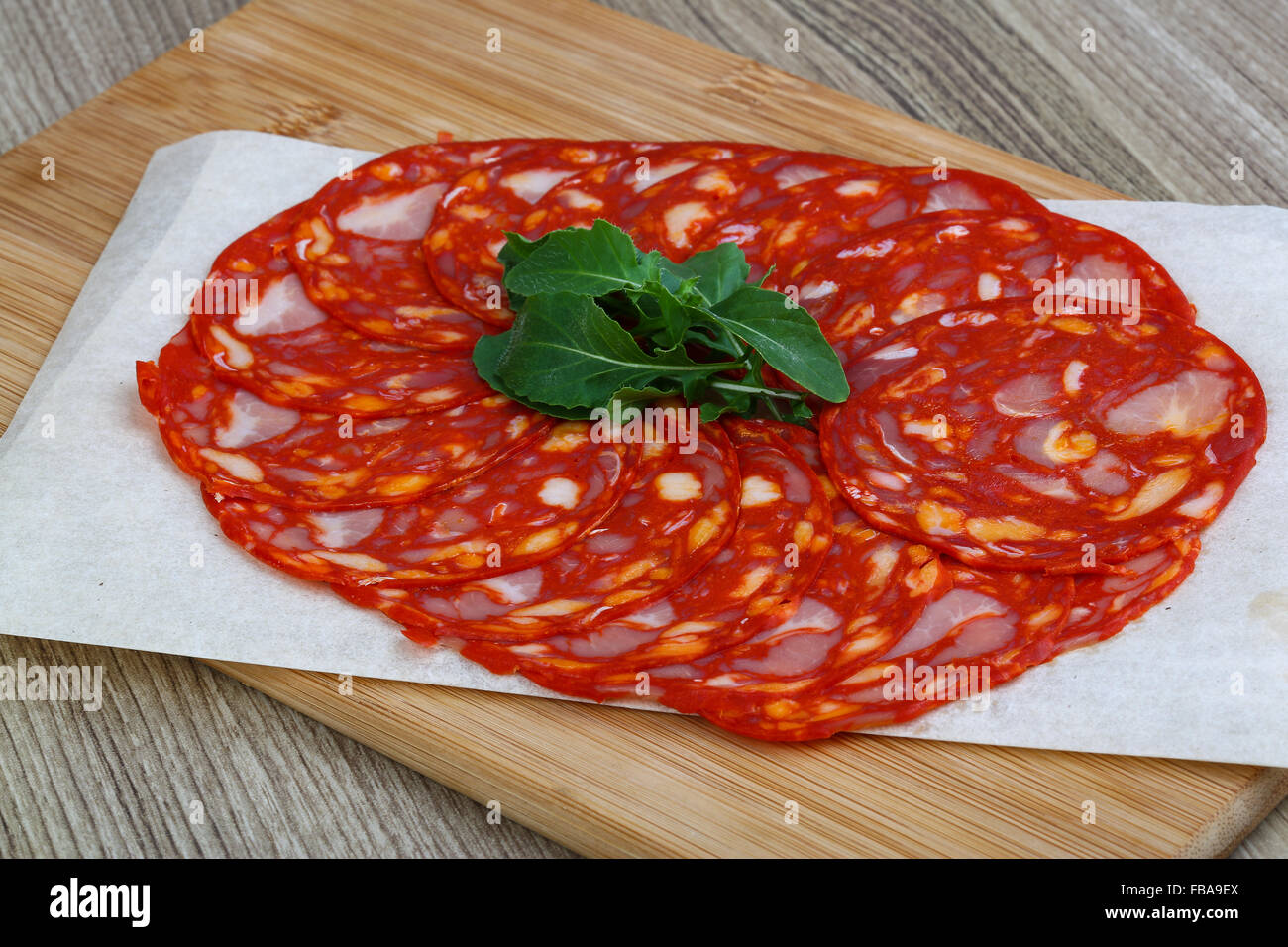 Traditional Spanish salami - Chorizo sausage on the wood background ...