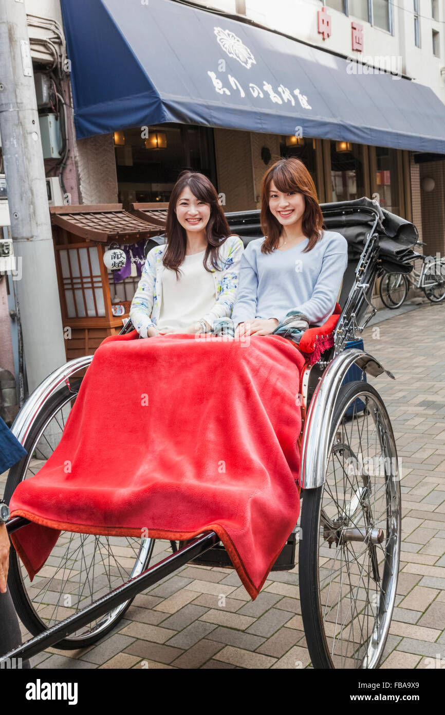 Japan, Honshu, Tokyo, Asakusa, Girls in Rickshaw Stock Photo - Alamy