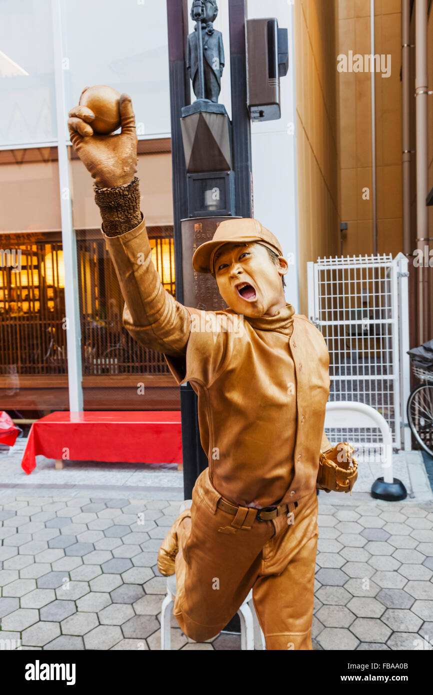 Japan, Honshu, Tokyo, Asakusa, Human Statue dressed as Baseball Player ...