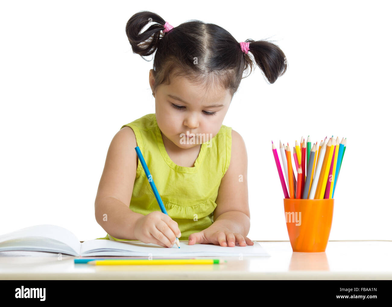 dreamy kid girl with pencils Stock Photo - Alamy
