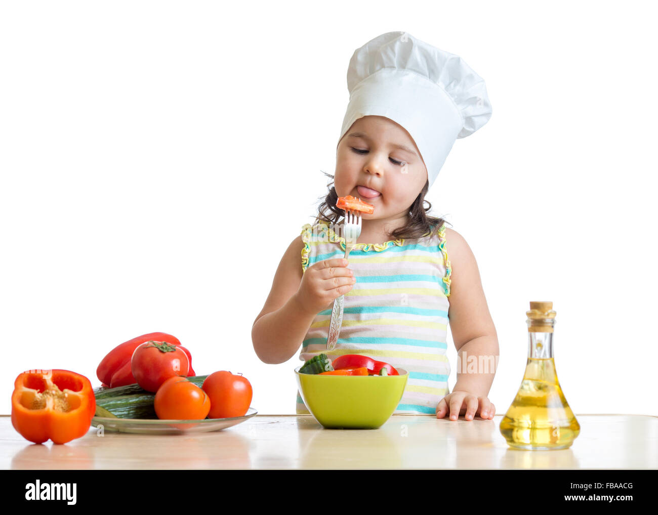 Child eating green vegetables hi-res stock photography and images - Alamy