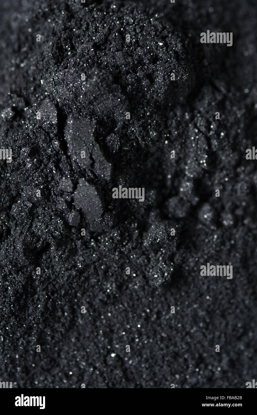 Activated charcoal powder shot with a macro lens Stock Photo - Alamy