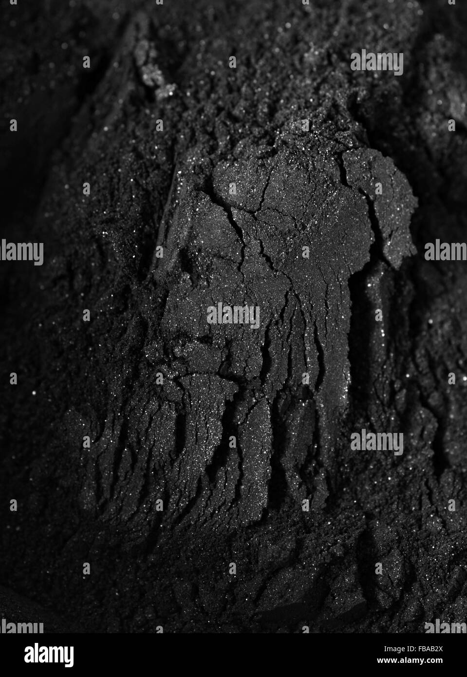 Activated charcoal powder shot with a macro lens Stock Photo - Alamy
