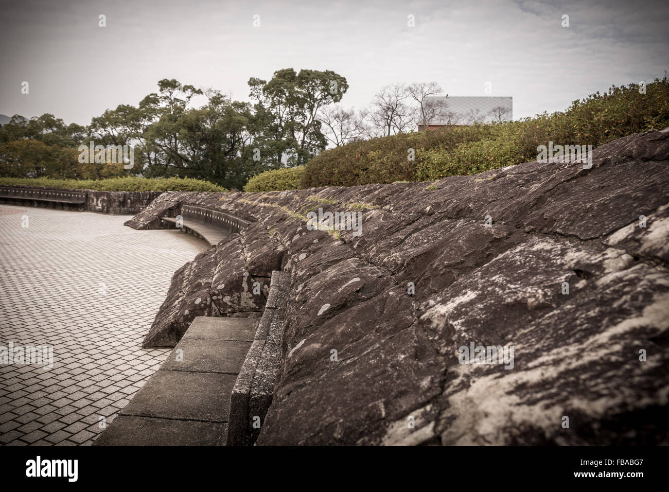 Vintage scene of stone wall in public park Stock Photo - Alamy