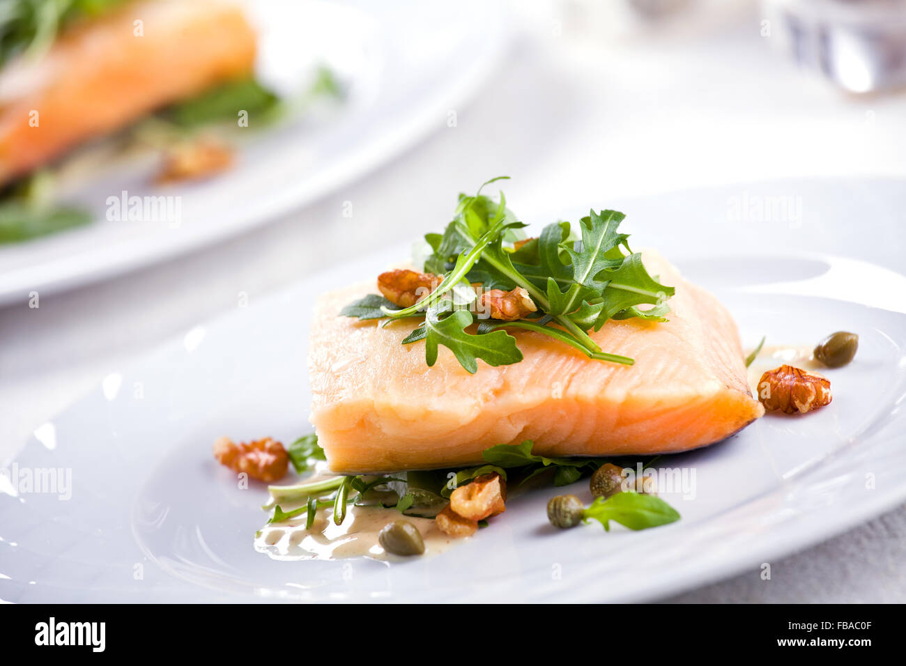 Photograph of a fancy meal of fresh salmon Stock Photo - Alamy