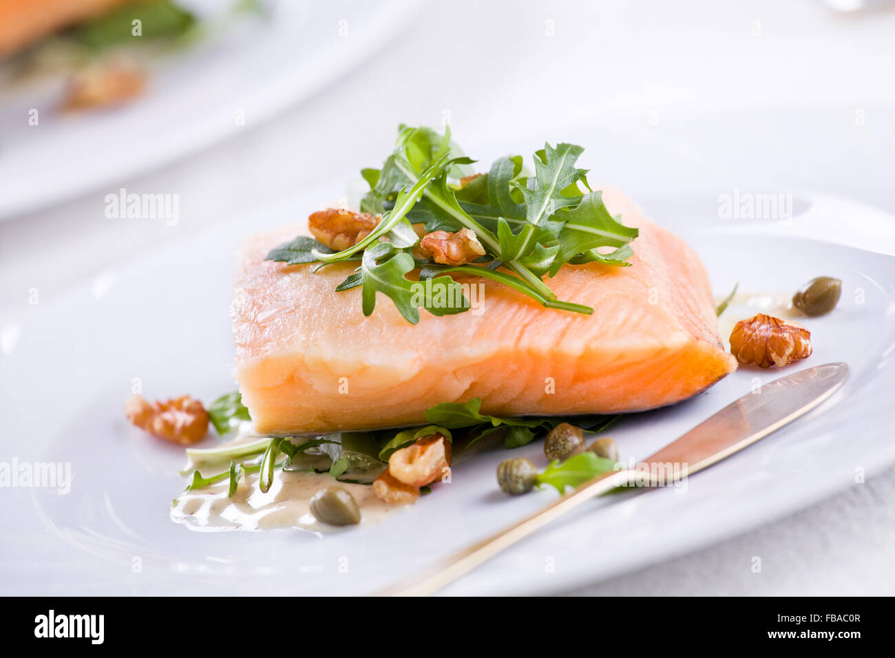 Photograph of a fancy meal of fresh salmon Stock Photo - Alamy