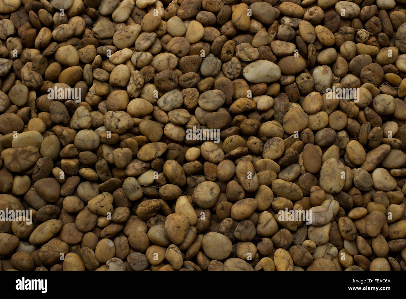 Round Pebbles texture Stock Photo - Alamy