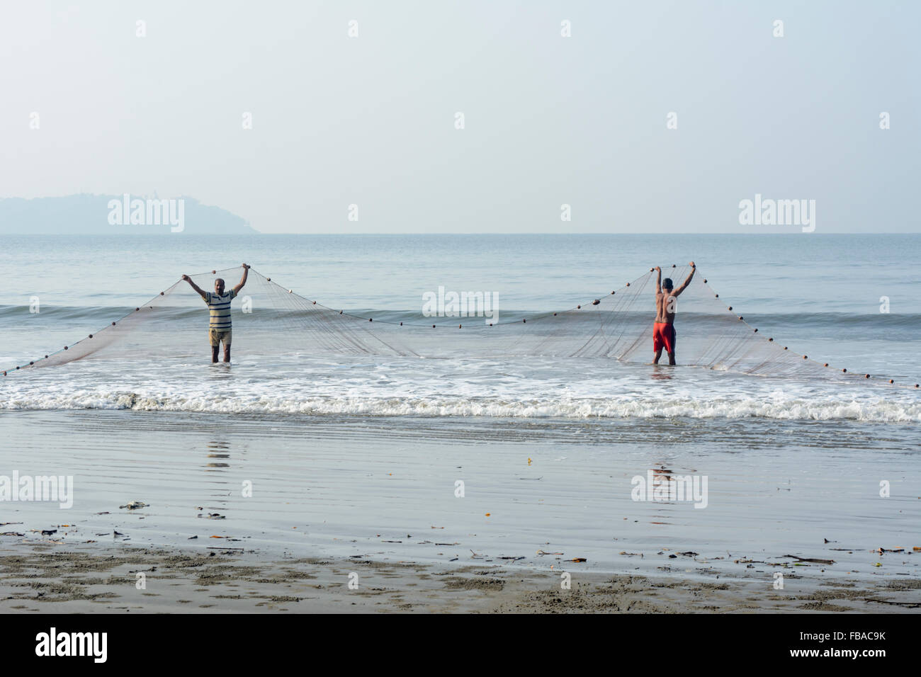 Fishermen hauling in nets sea hi-res stock photography and images - Alamy