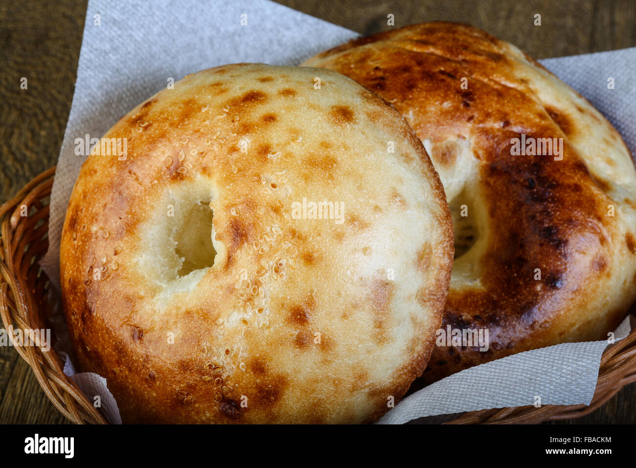 Traditional Uzbek bread on the wood background Stock Photo - Alamy