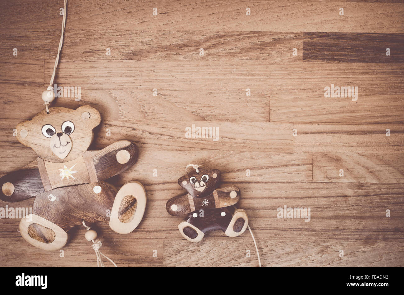 hand made wood teddy bear on a natural wood background Stock Photo - Alamy