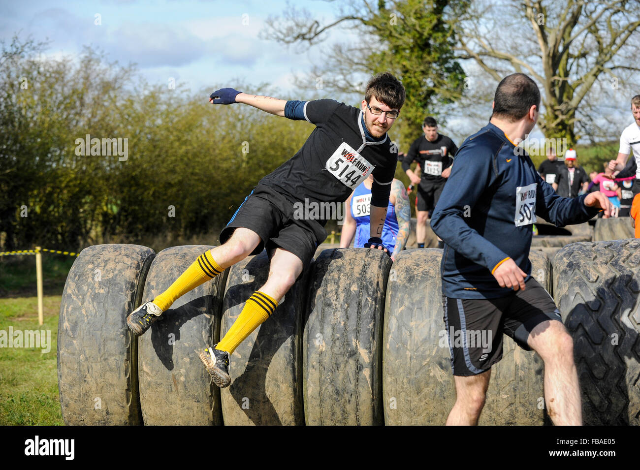 Runners at obstacle course race, UK Stock Photo - Alamy