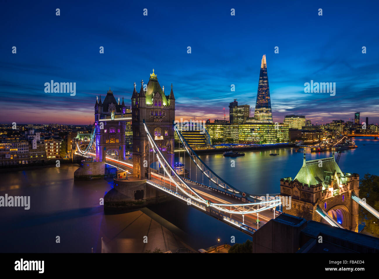 Nightfall, Tower Bridge and the Shard seen from a London hotel, London ...